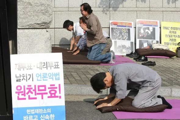 Praying for Court to block new media ownership laws
